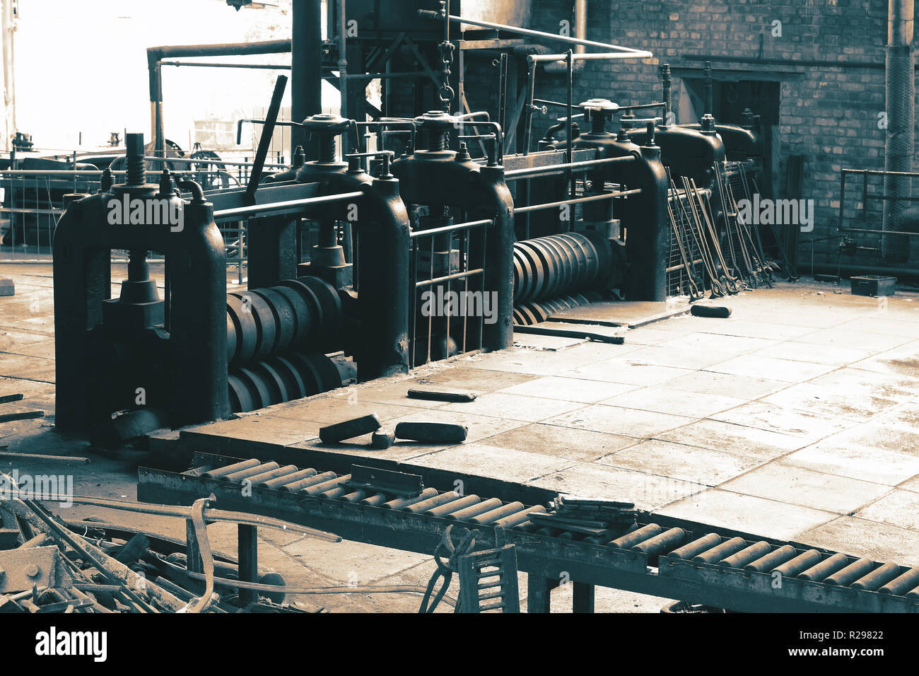 Victorian machine workshop factory with metal press machines with ...