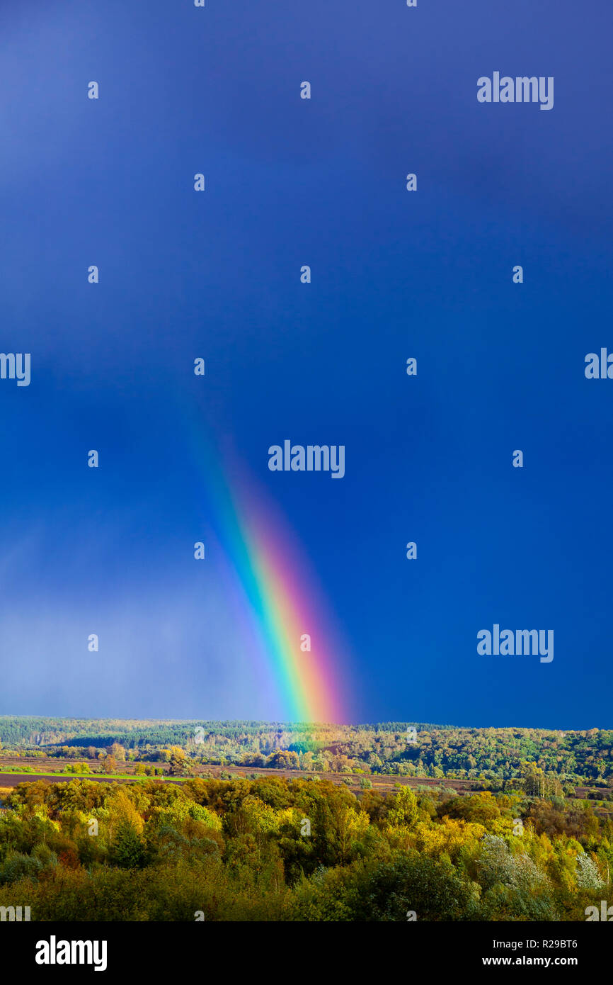 Blue sky with clouds on horizon and rainbow background hi-res stock ...