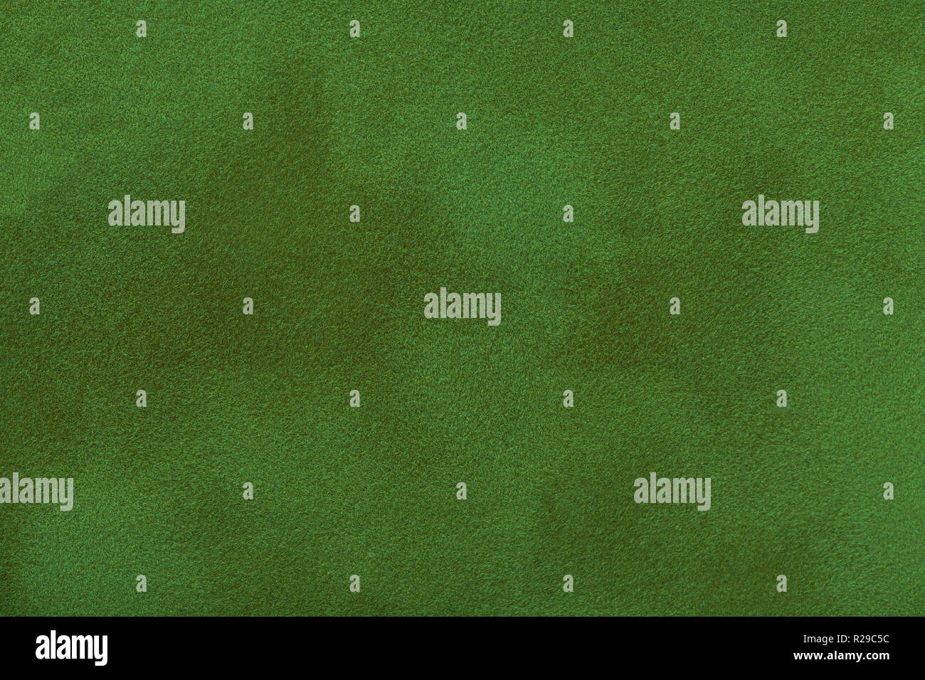 Dark green matte background of suede fabric, closeup. Velvet texture of ...