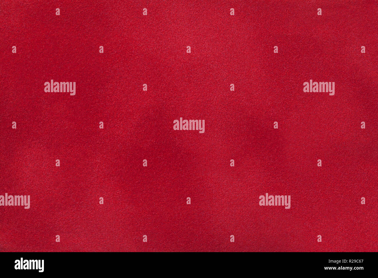 Dark red matte background of suede fabric, closeup. Velvet texture of ...