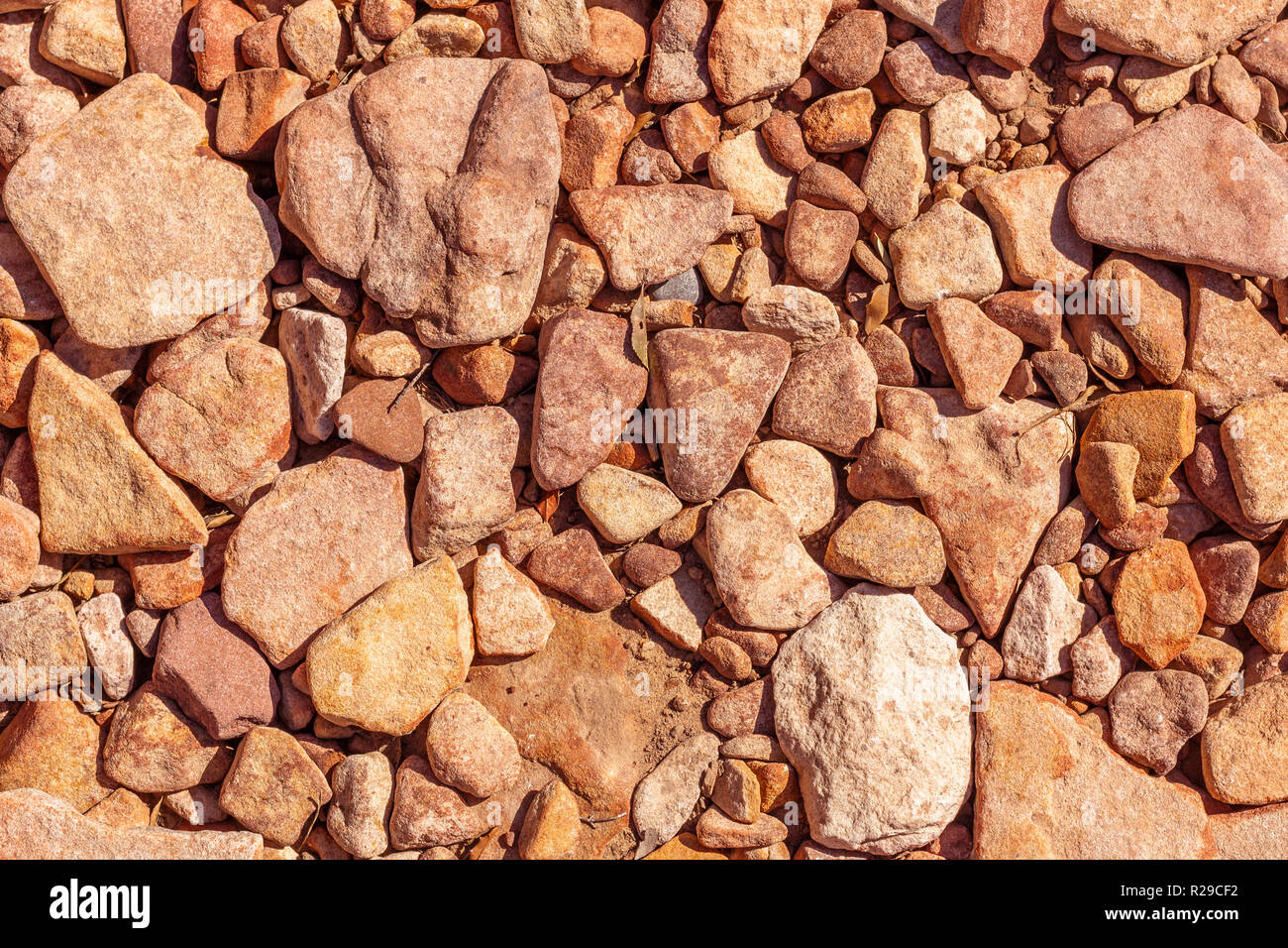 Stone ground texture. Umber mediterranean stones on the ground. Mediterranean background Stock ...