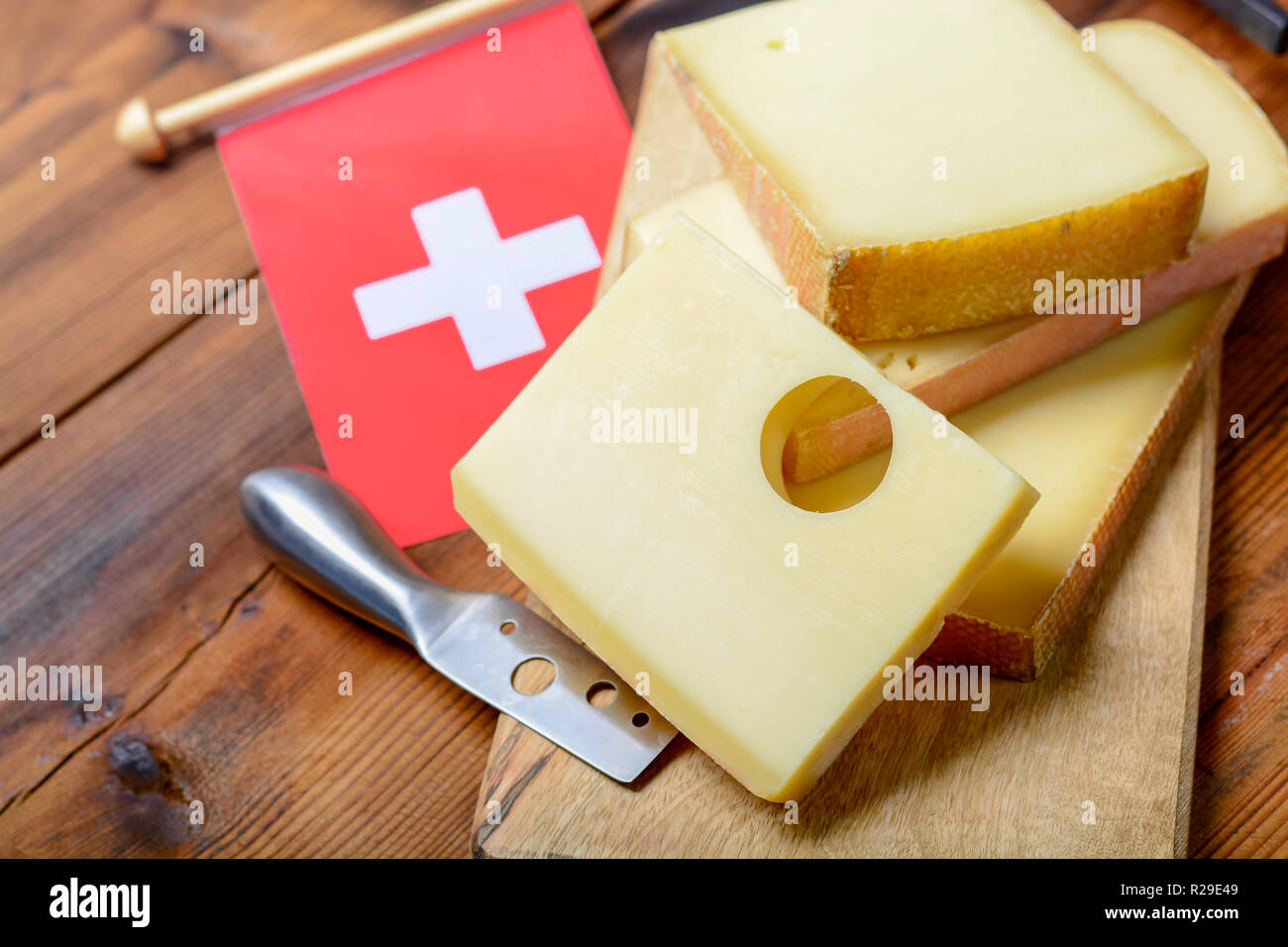 Assortment of Swiss cheeses Emmental or Emmentaler medium-hard cheese ...