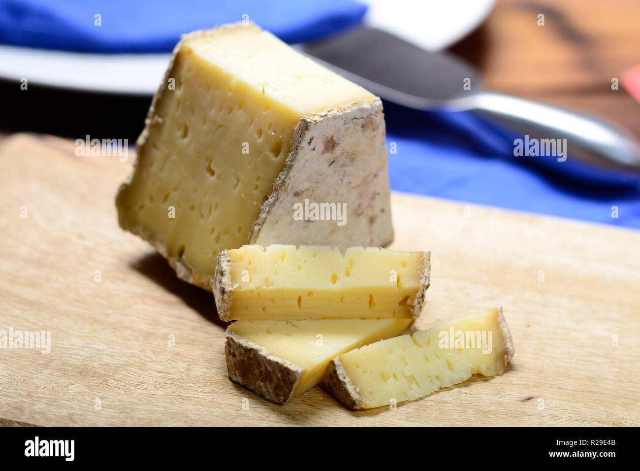 Piece of French Tomme cheese, produced in French Alps and in ...