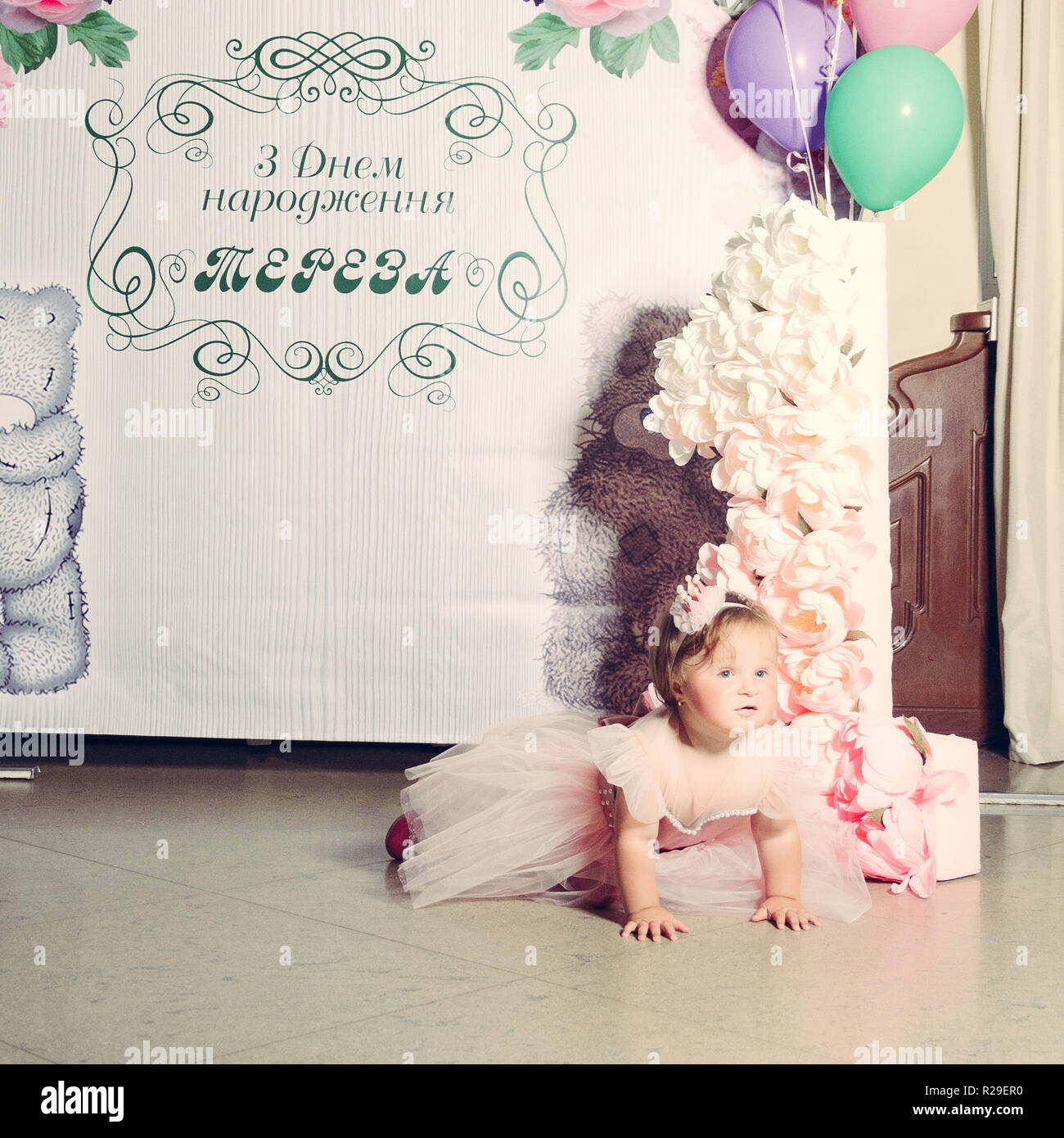 A little kid hugs a toy dwarf. 2018 Stock Photo - Alamy