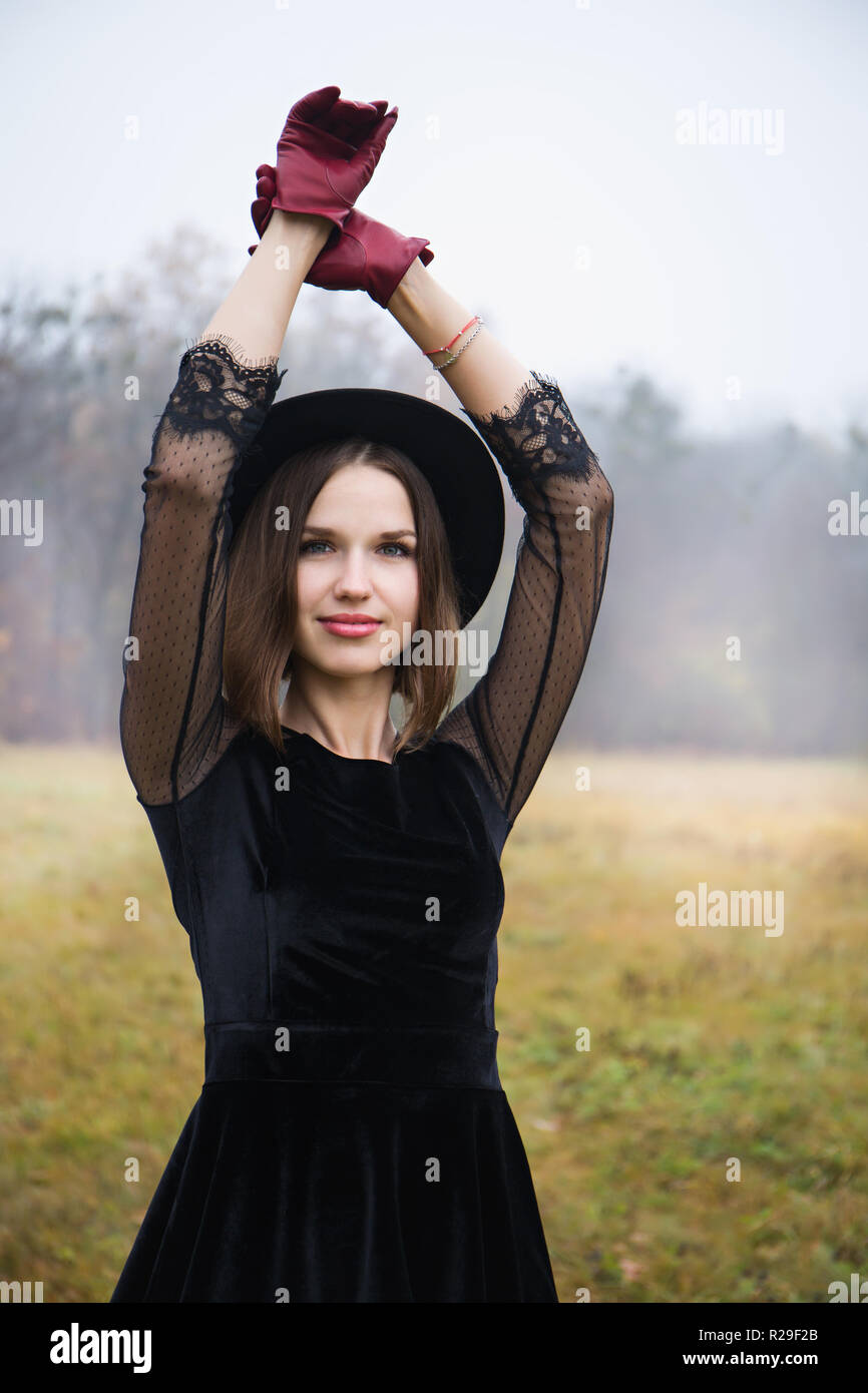 Girl raised her hands up hi-res stock photography and images - Alamy