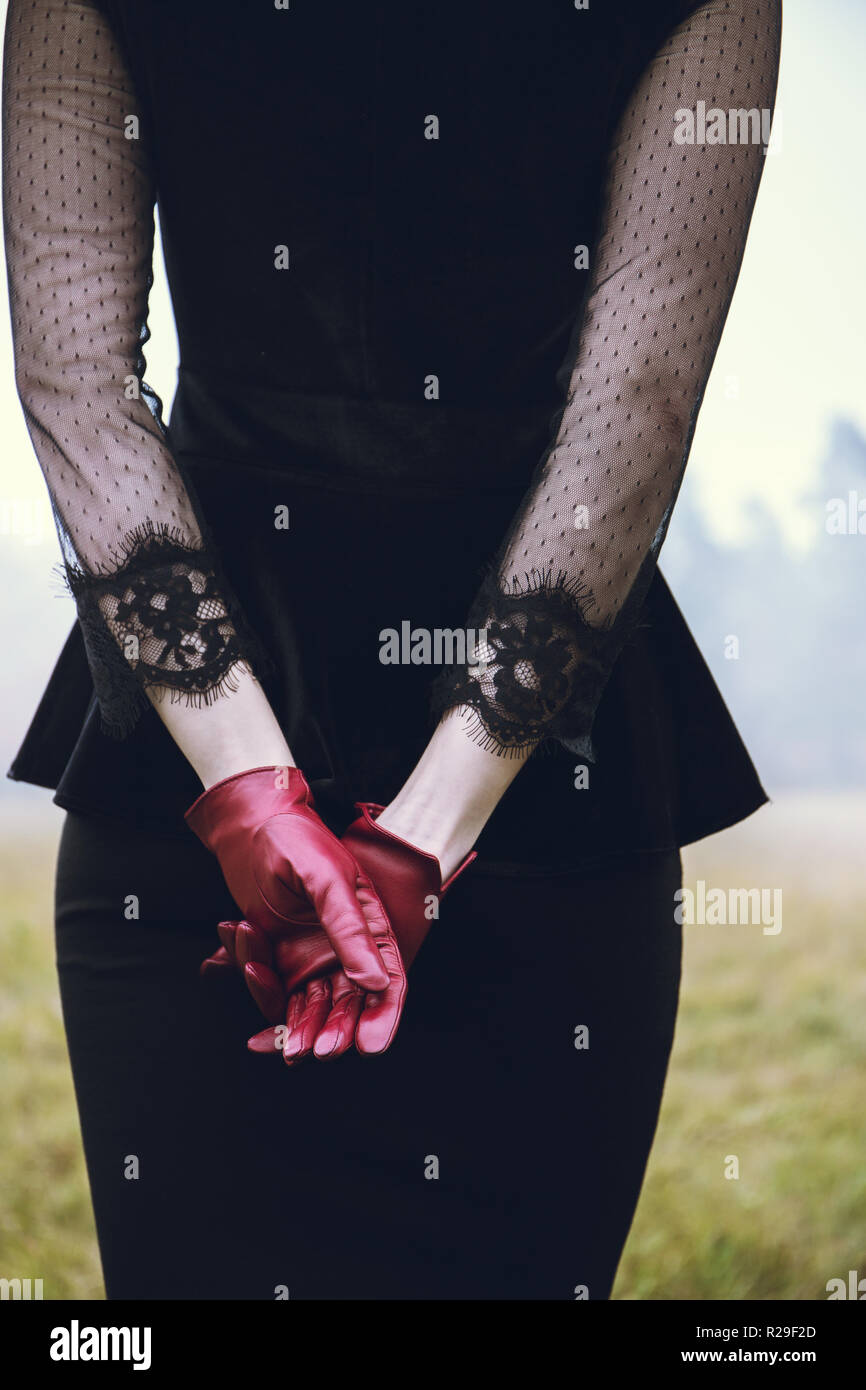 Girl stands back, close-up Stock Photo - Alamy