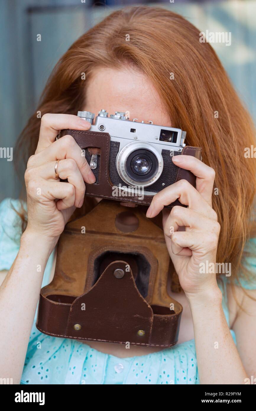 Girl with retro camera. Vintage Stock Photo - Alamy
