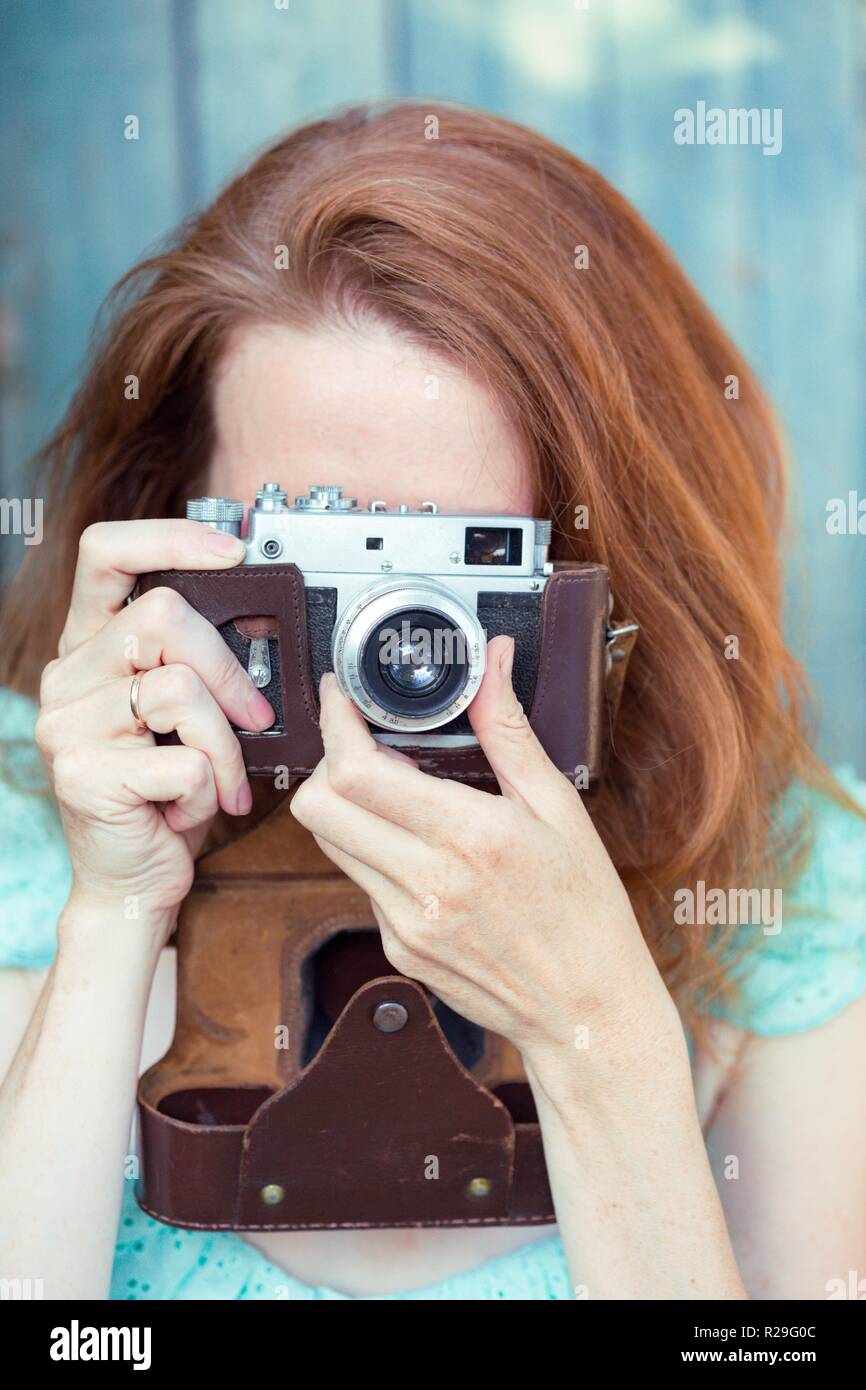 Girl with retro camera. Vintage Stock Photo - Alamy
