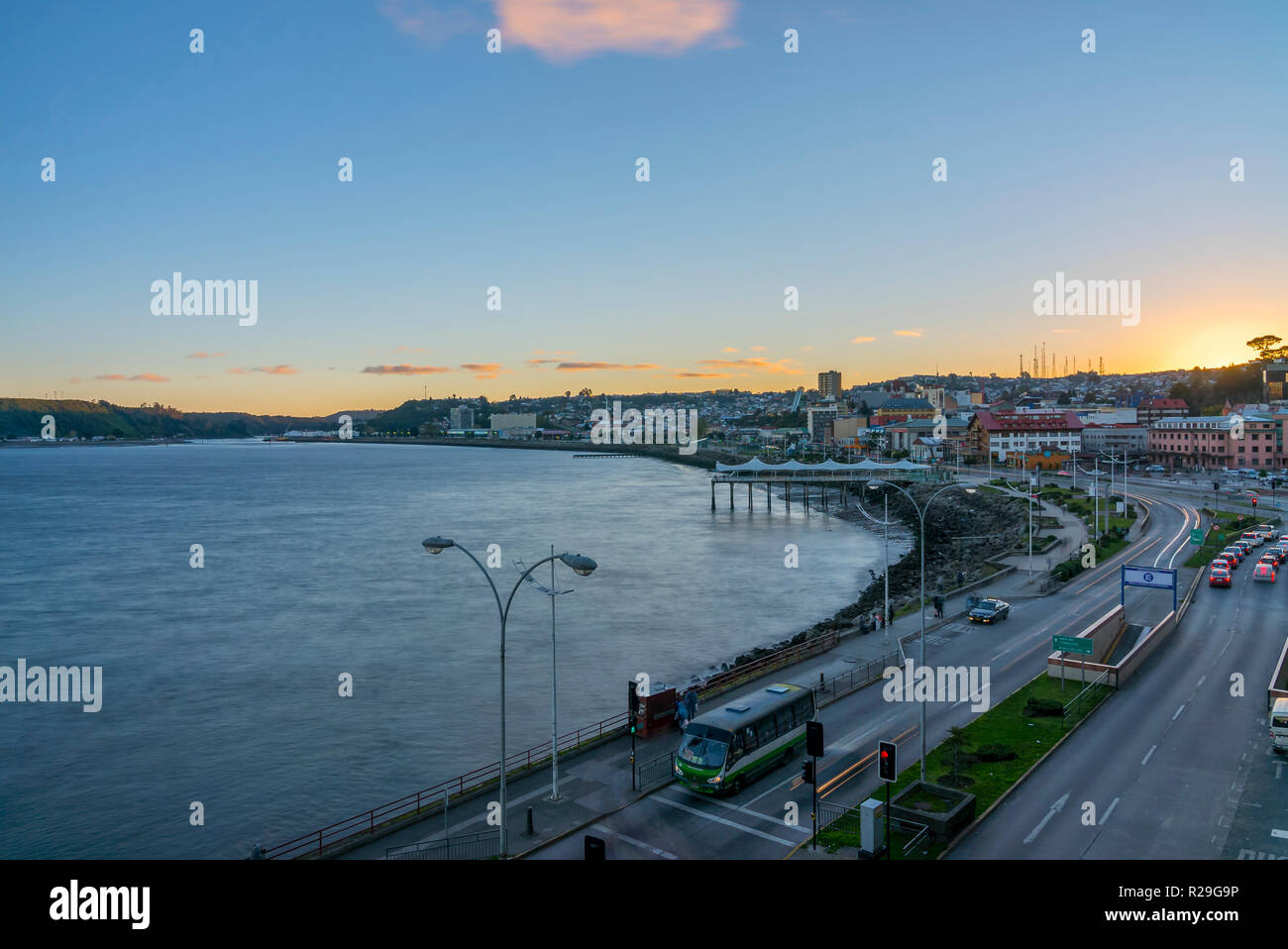 Landscape of the waterfront of Puerto Montt at sunset, an autumn day ...