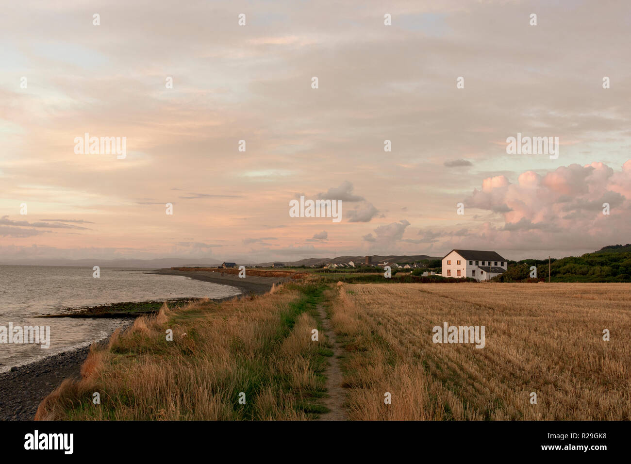 The Ceredigion Coastal path heading north towards Llanon Stock Photo ...