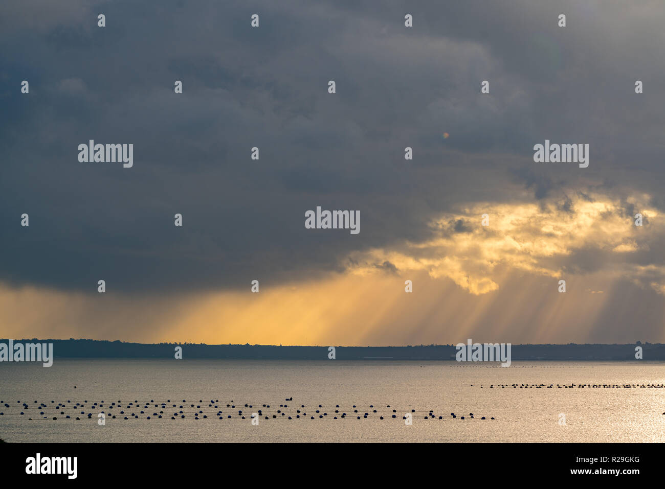 Sun rays pass through clouds hi-res stock photography and images - Alamy