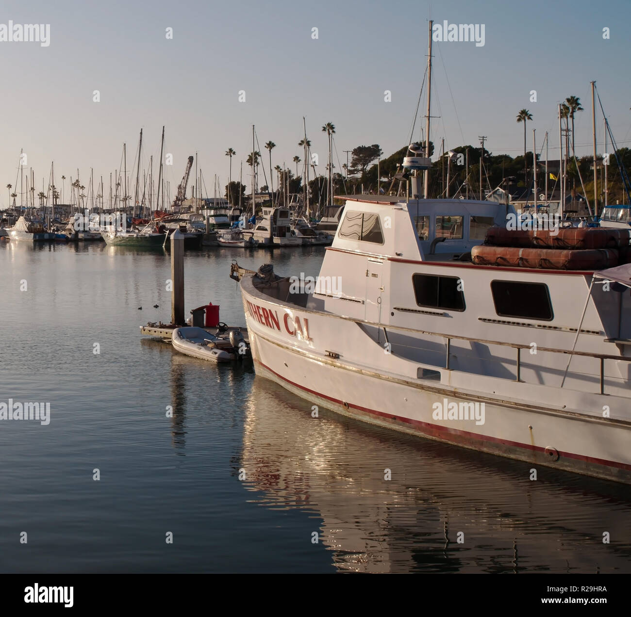 Different seafaring boats docked at the Oceanside Harbor Marina in ...