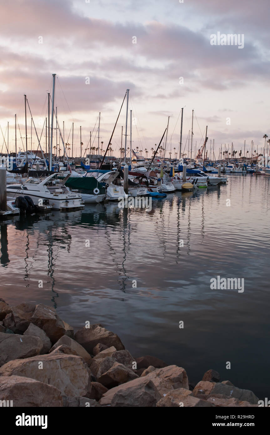 Different seafaring boats docked at the Oceanside Harbor Marina in ...