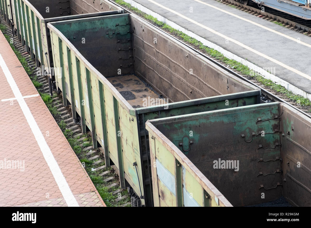 Empty railway cars on the ways of the railway station Stock Photo - Alamy