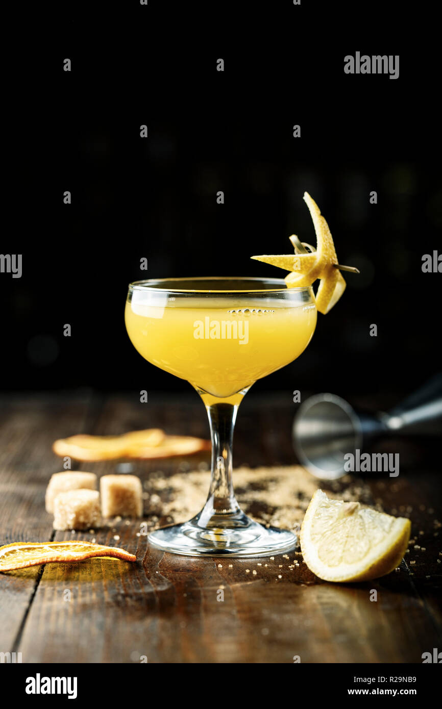 preparation of an alcoholic cocktail with orange and brown sugar Stock ...