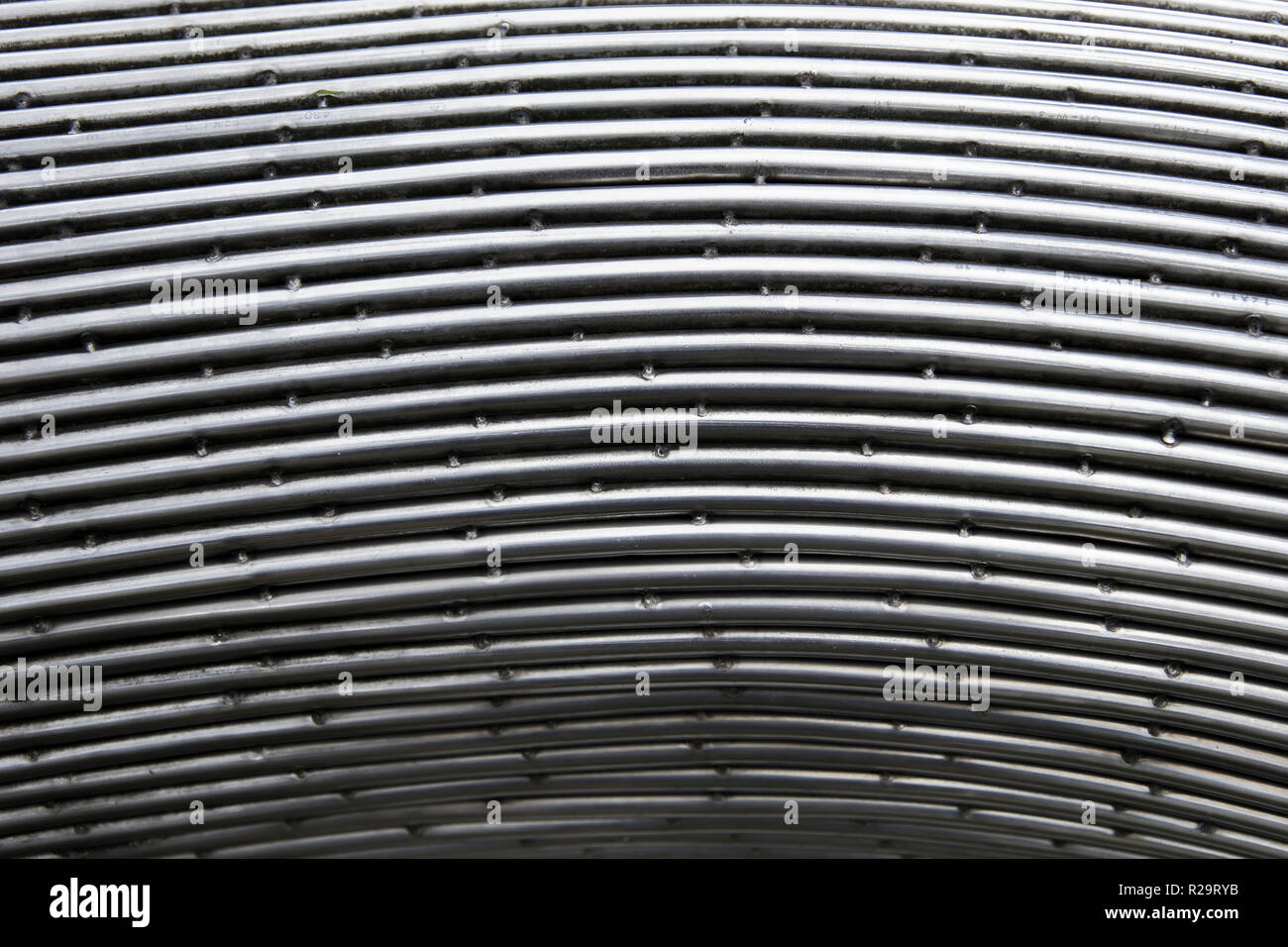 Closeup detail of the tubular sheet metal backdrop Stock Photo - Alamy