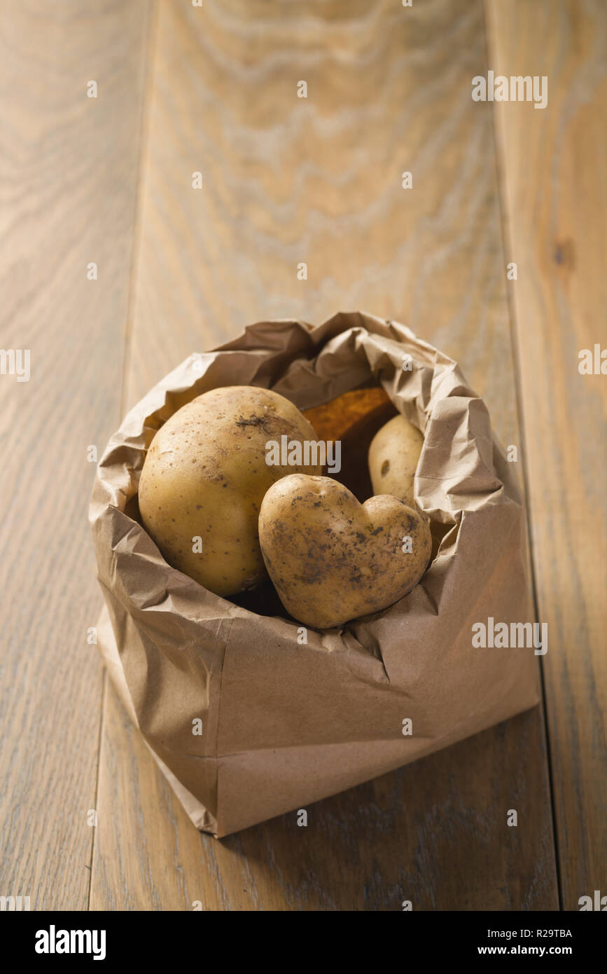 Potatoes in paper bag hi-res stock photography and images - Alamy