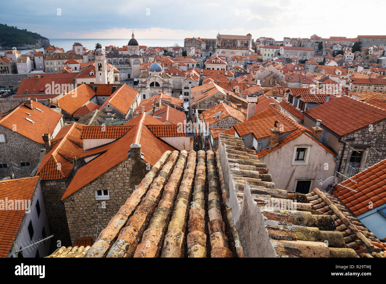 Ancient roof with view of old town Dubrovnik with church towers and ... Ancient roof with view of old town Dubrovnik with church towers and ...