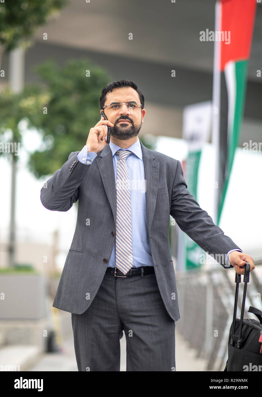 Young arab businessman in suit hi-res stock photography and images - Alamy