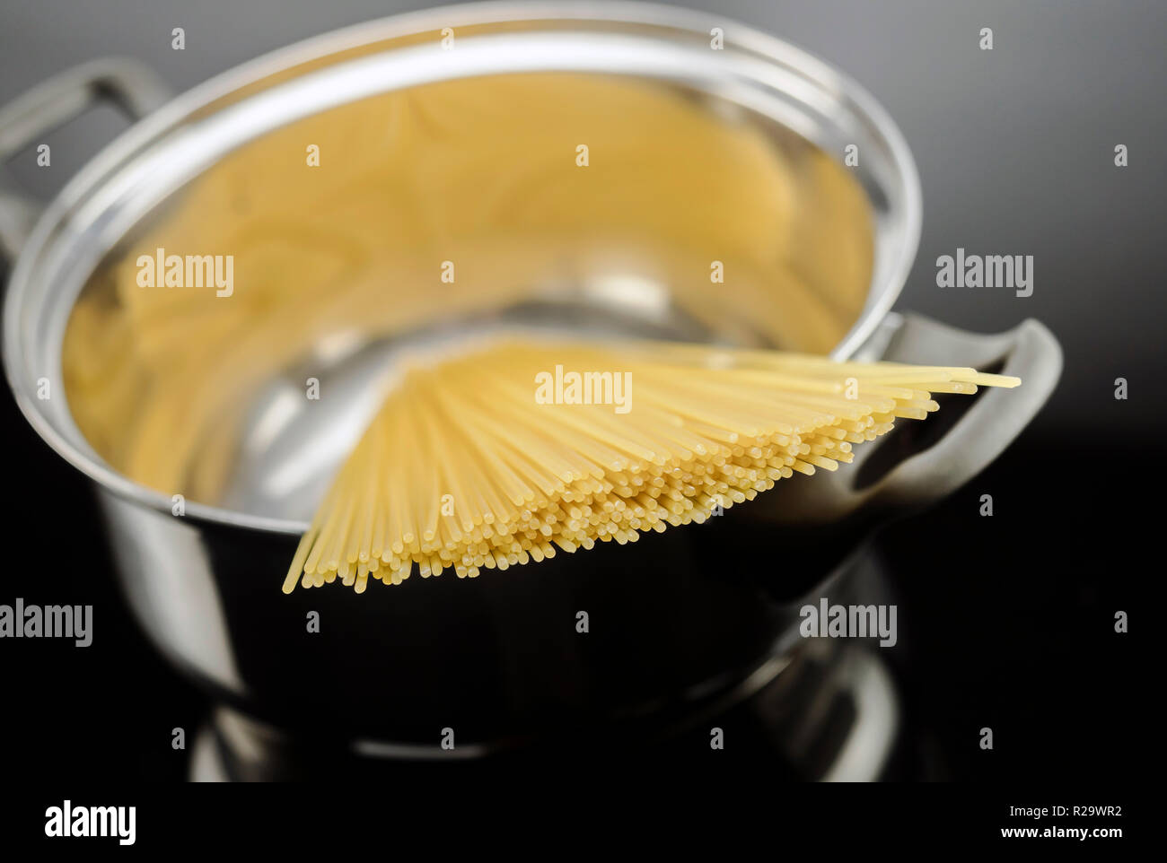 Spaghetti inside a pot, conceptual image Stock Photo - Alamy