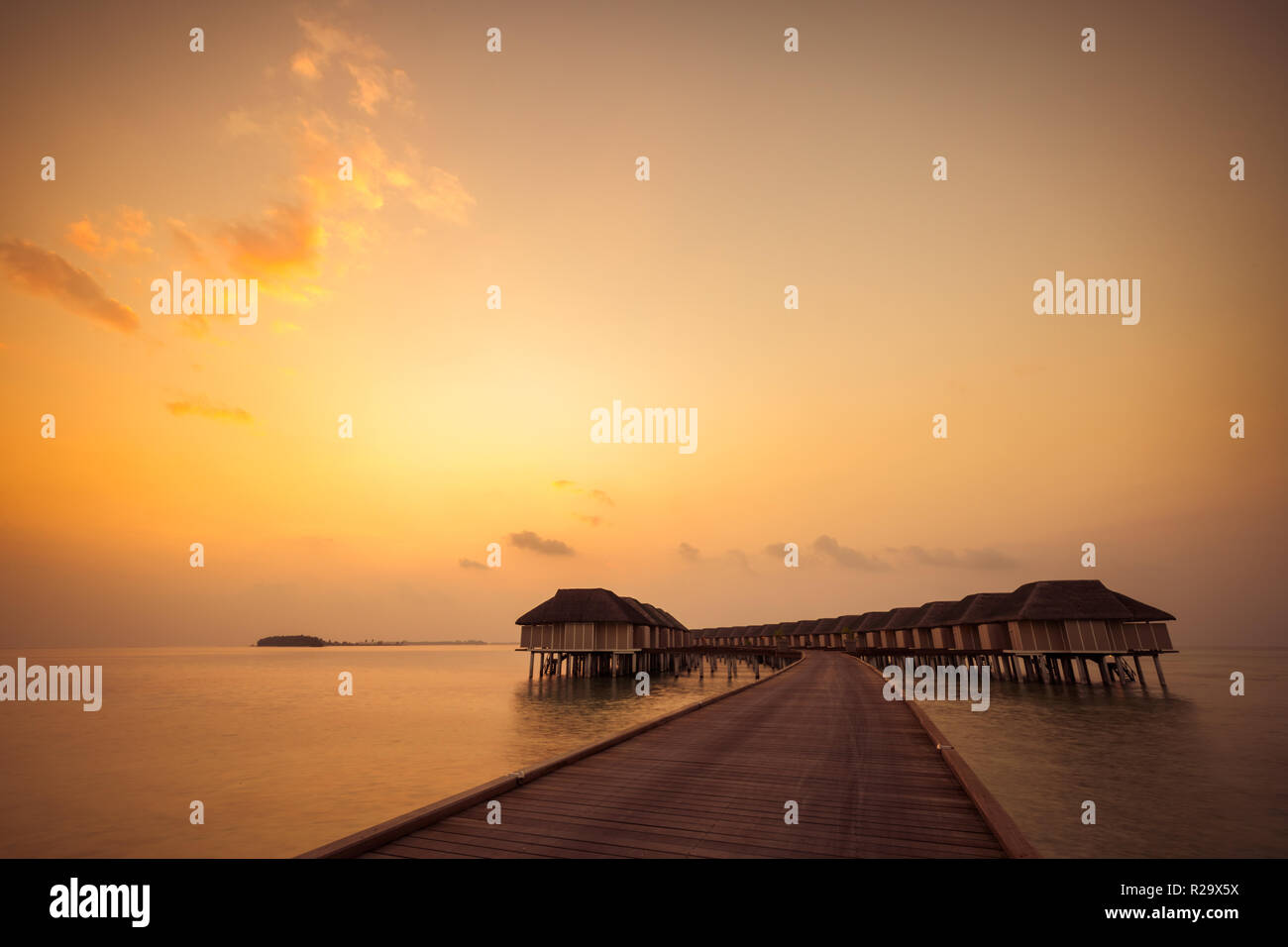 Amazing sunset sky and reflection on calm sea, Maldives beach landscape ...