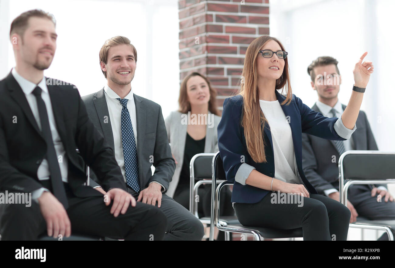 Interested woman asking for questions Stock Photo - Alamy