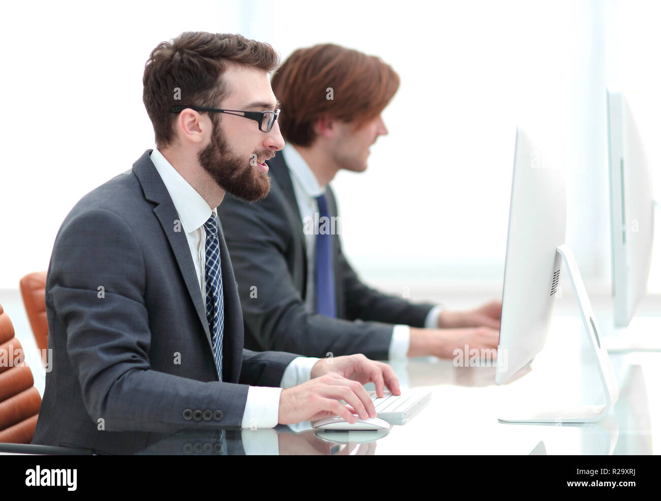 Company employees working in software development Stock Photo - Alamy