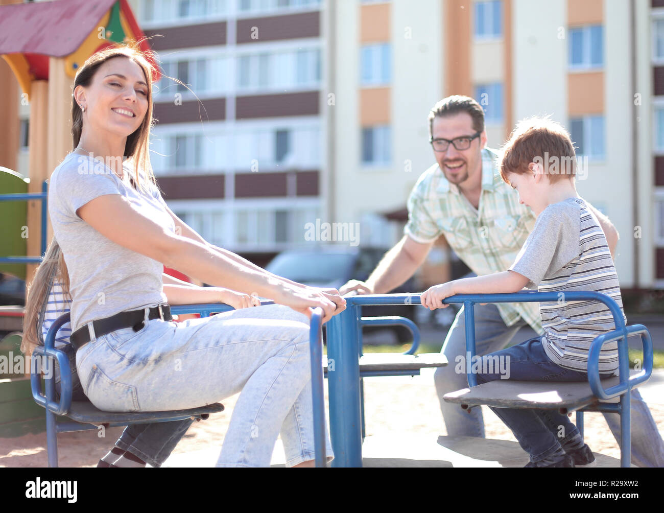 happy family on the Playground Stock Photo - Alamy