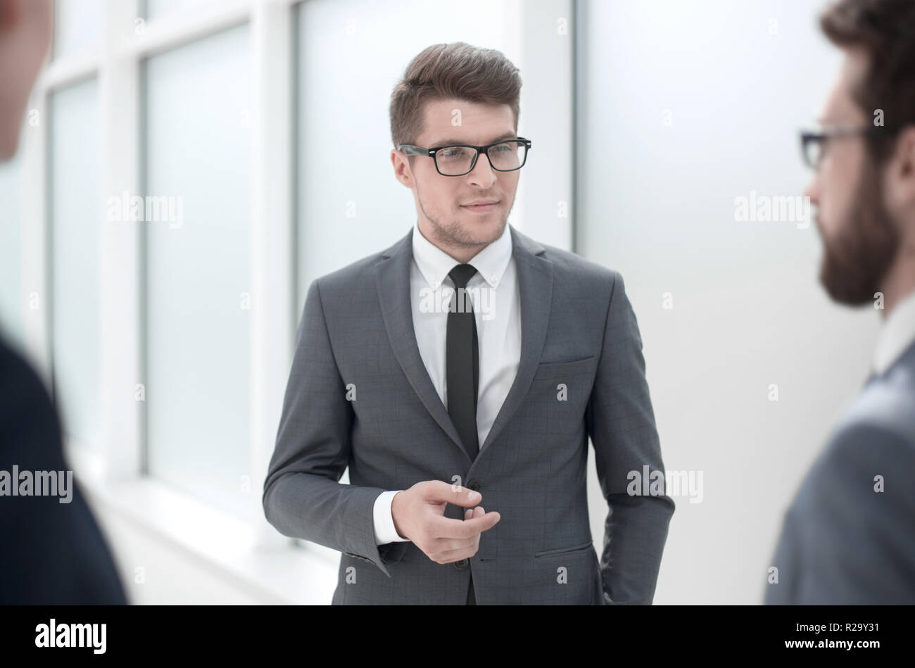 boss and staff standing in the office Stock Photo - Alamy