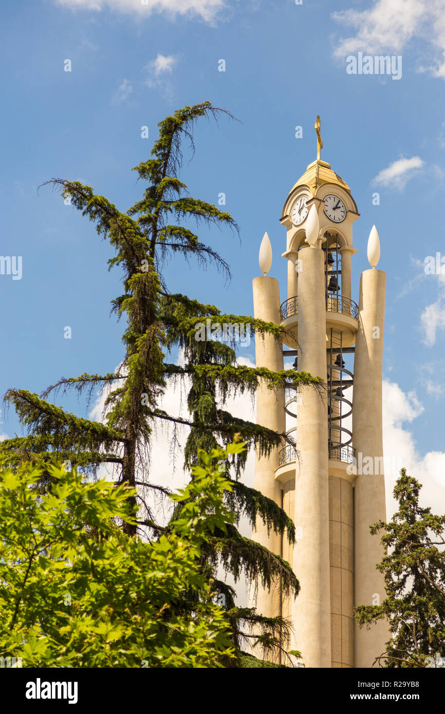 Tirana, Albania- 01 July 2014: Clock Tower in Rinia Park in the center ...