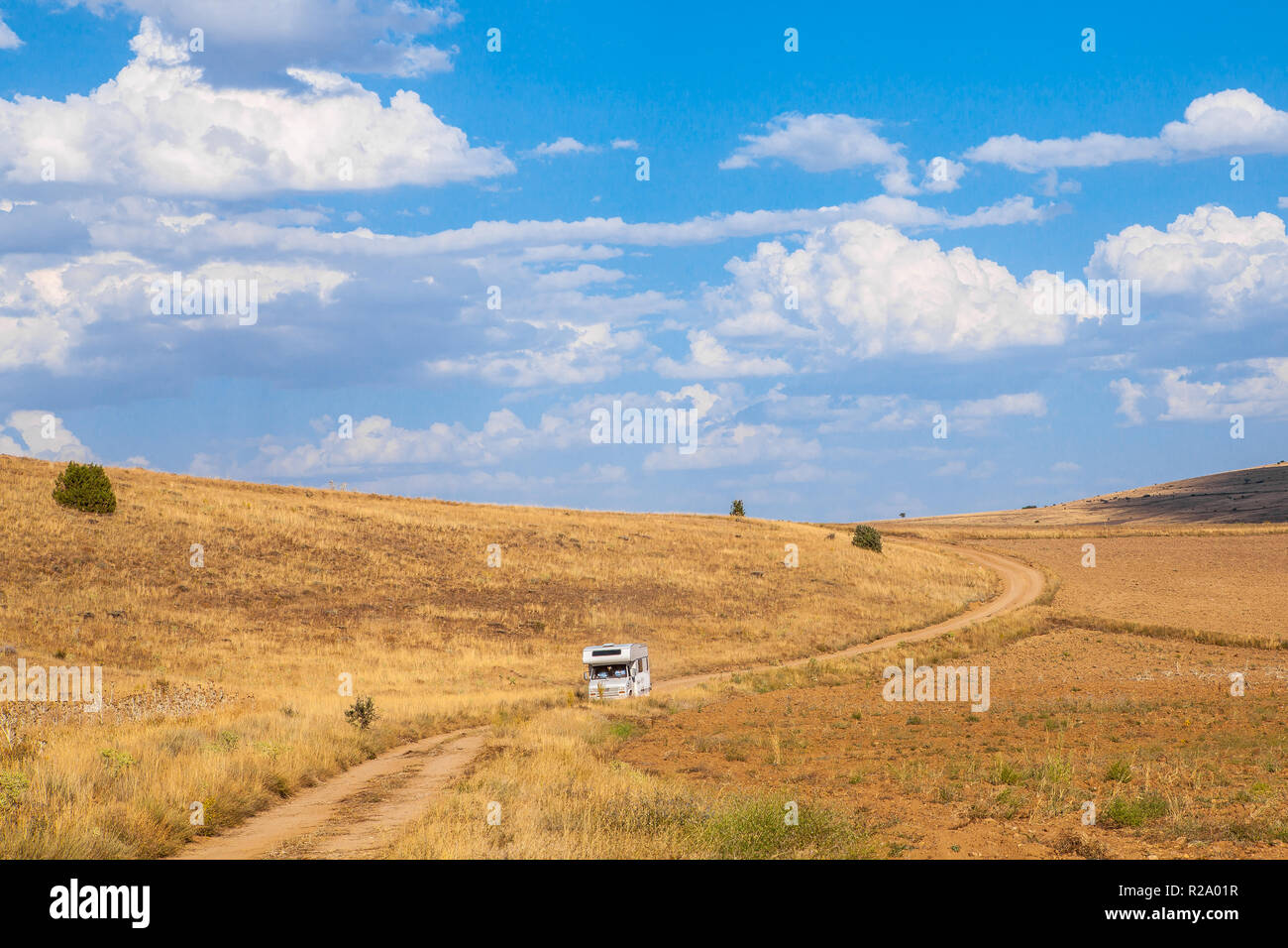 Caravan car travels on path Stock Photo - Alamy