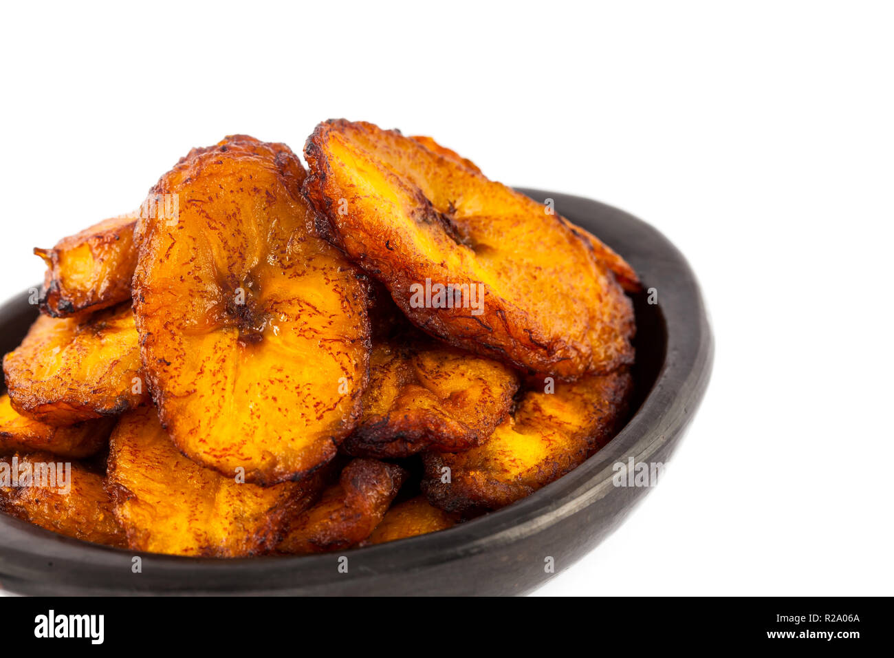 Deep fried ripe plantain slices isolated in white background Stock ...