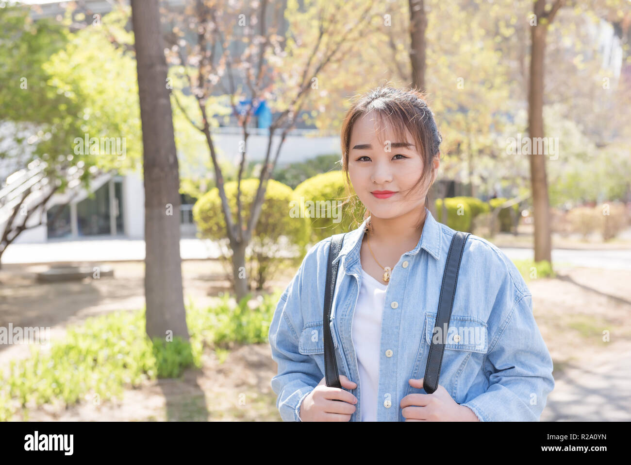 A portrait of an Asian college student at campus Stock Photo - Alamy