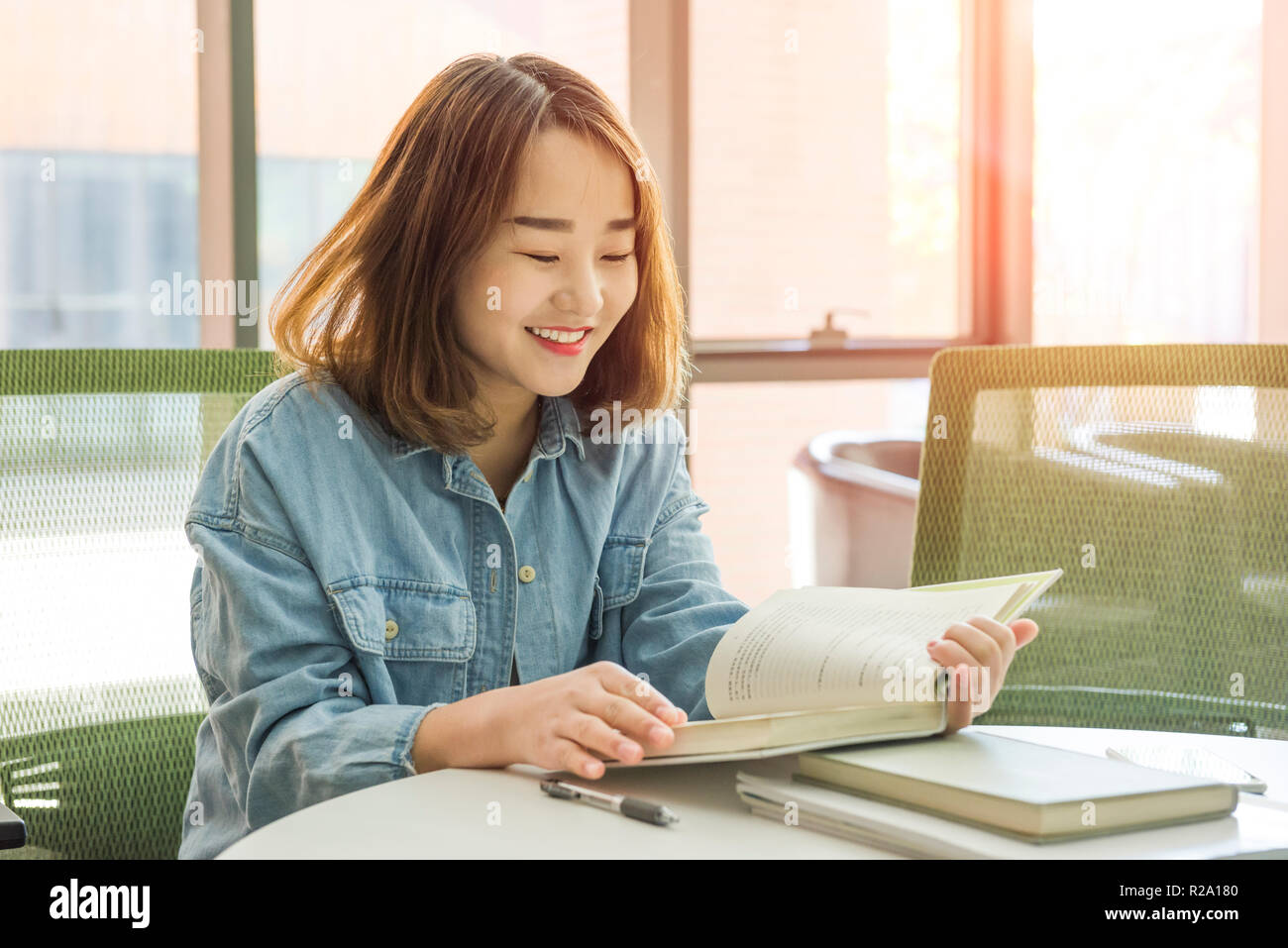 Asian student studying. A portrait of college student at campus Stock ...