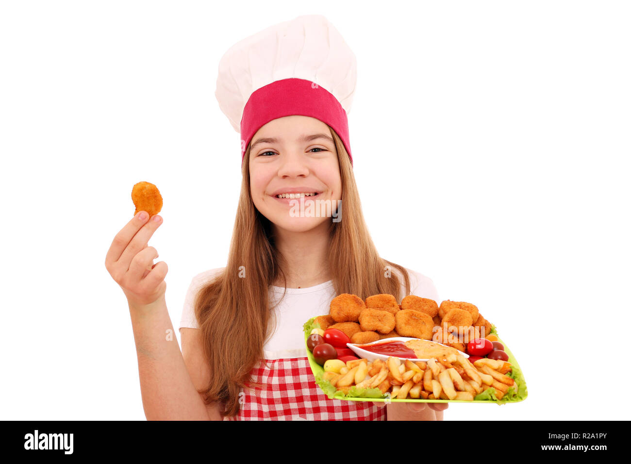 Happy girl cook with chicken nuggets fast food Stock Photo - Alamy