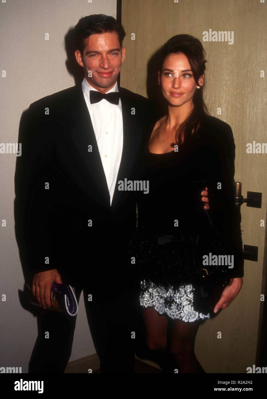 BEVERLY HILLS, CA - JANUARY 23: Singer Harry Connick Jr. and wife model ...