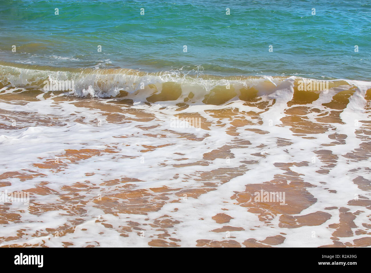Sea waves roll on the sea shore. Closeup Stock Photo - Alamy