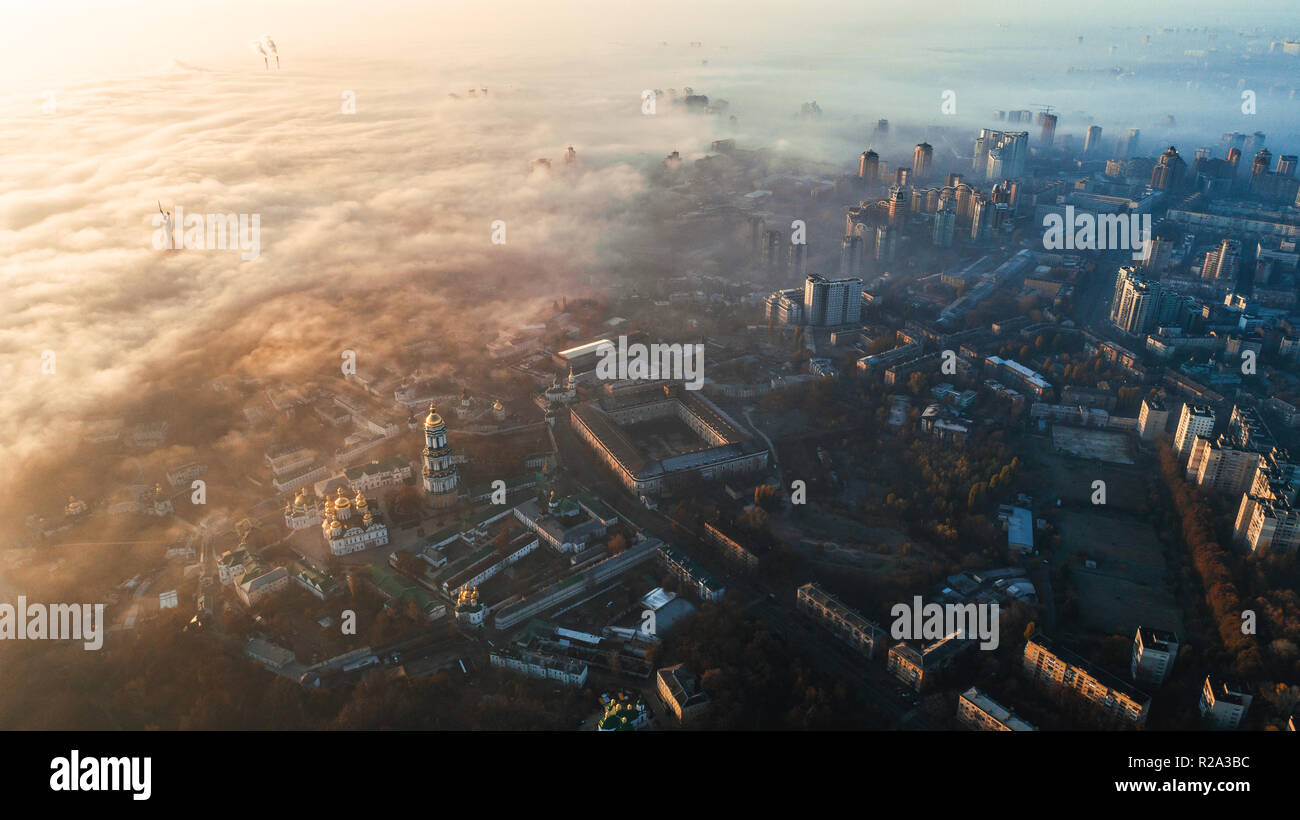 Aerial view of the city in dense fog Stock Photo - Alamy