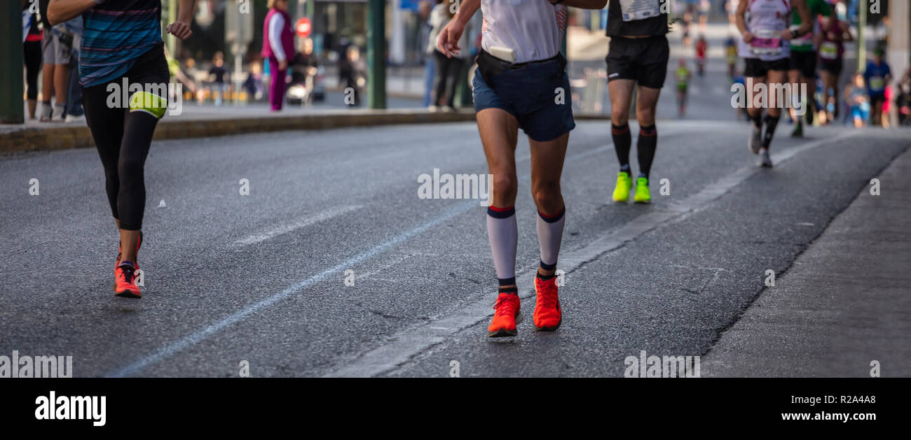 Marathon running race, group of runners on city roads, banner, detail ...