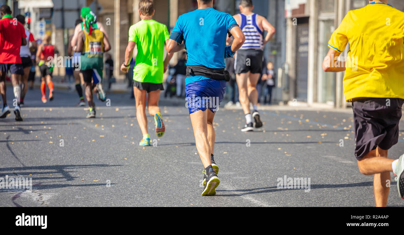 Group athletes running city hi-res stock photography and images - Alamy