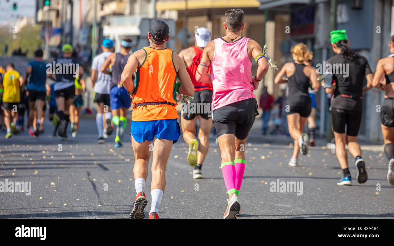Marathon running race, group of runners on city roads, back view Stock ...