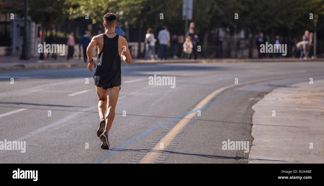 Man running back view one hi-res stock photography and images - Alamy