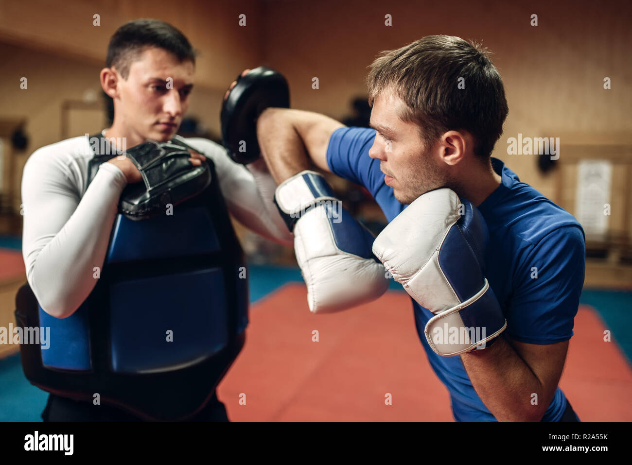 Male boxing trainer doing pad hi-res stock photography and images - Alamy