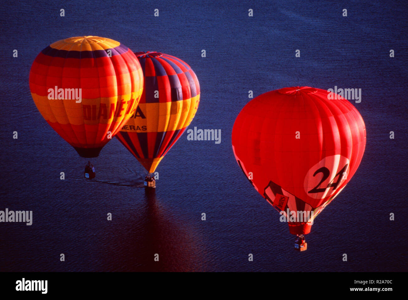 East-Australia: Three balloons flying over the pacific ocean near ...