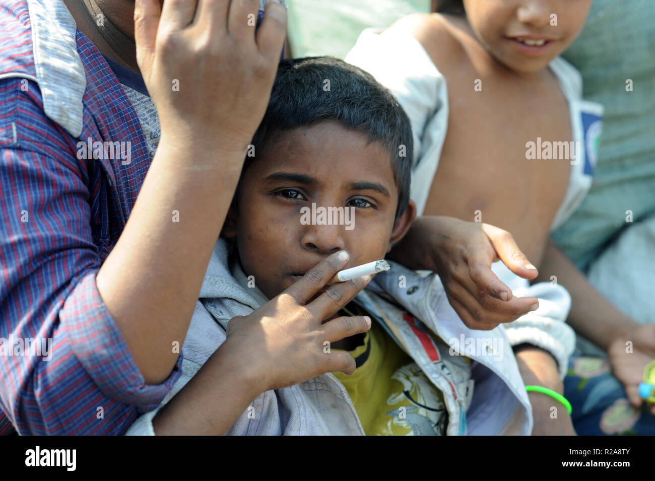 Dhaka, Bangladesh - January 25, 2014: Bangladeshi drug addicts street ...