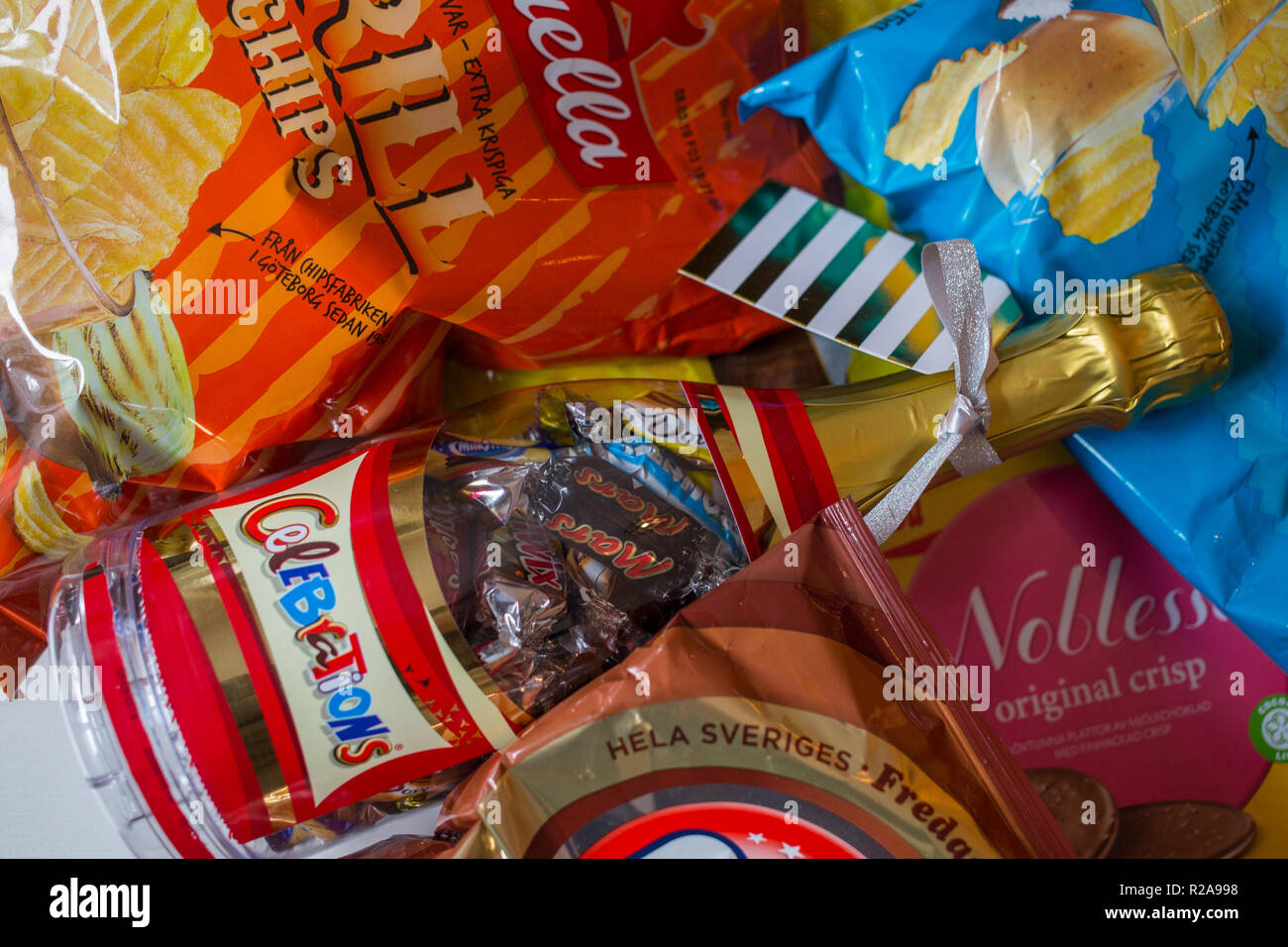 Snacks in a big pile on a table Stock Photo - Alamy