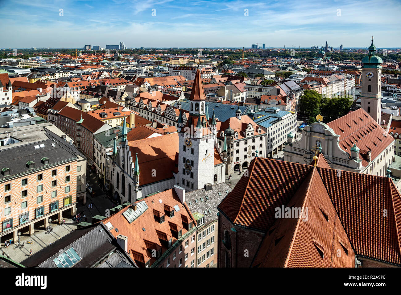 Old Town Hall (featuring clock tower, center) and rooftops, Marienplatz ...