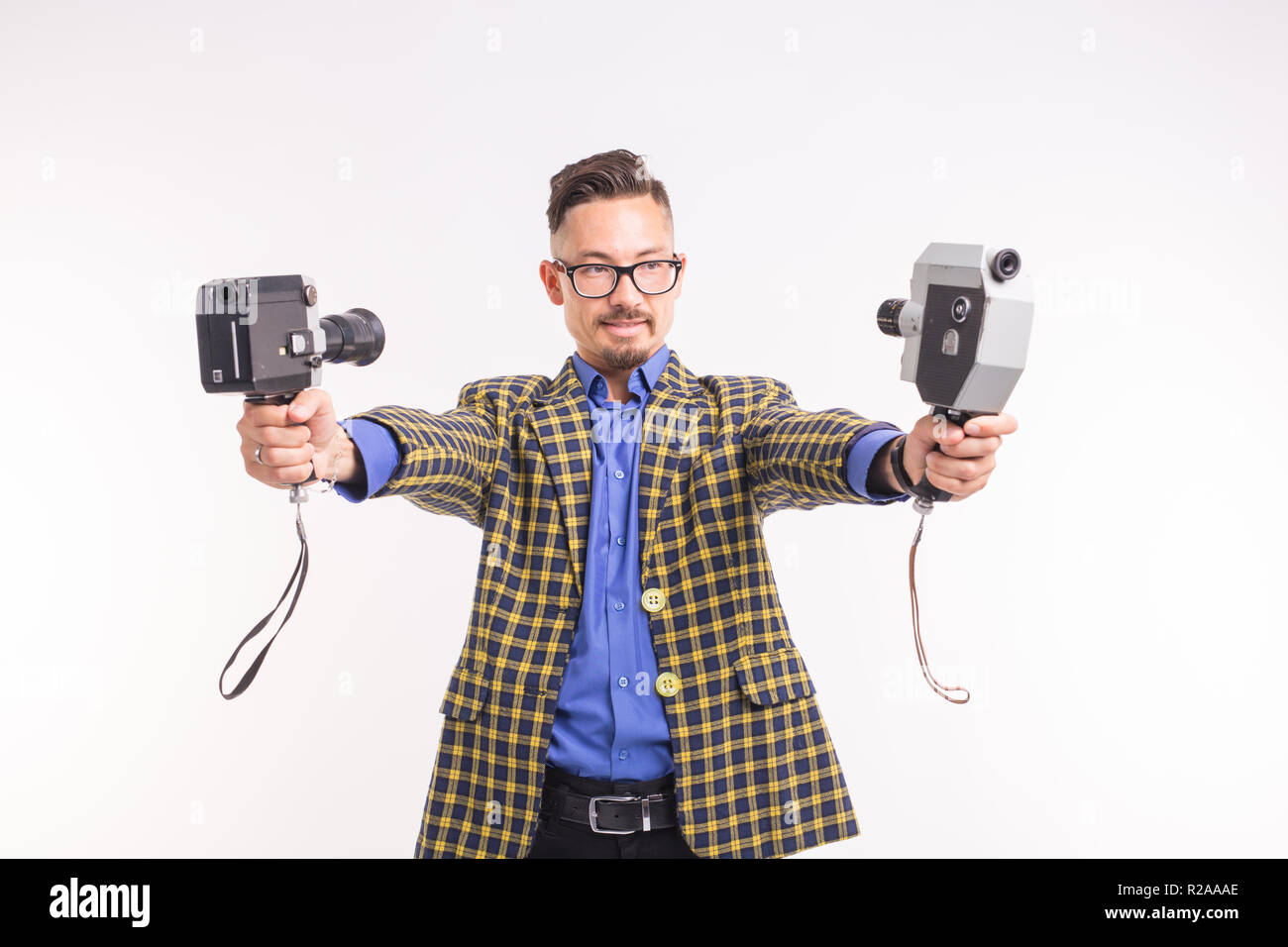 Technologies, photographing and people concept - handsome young man ...