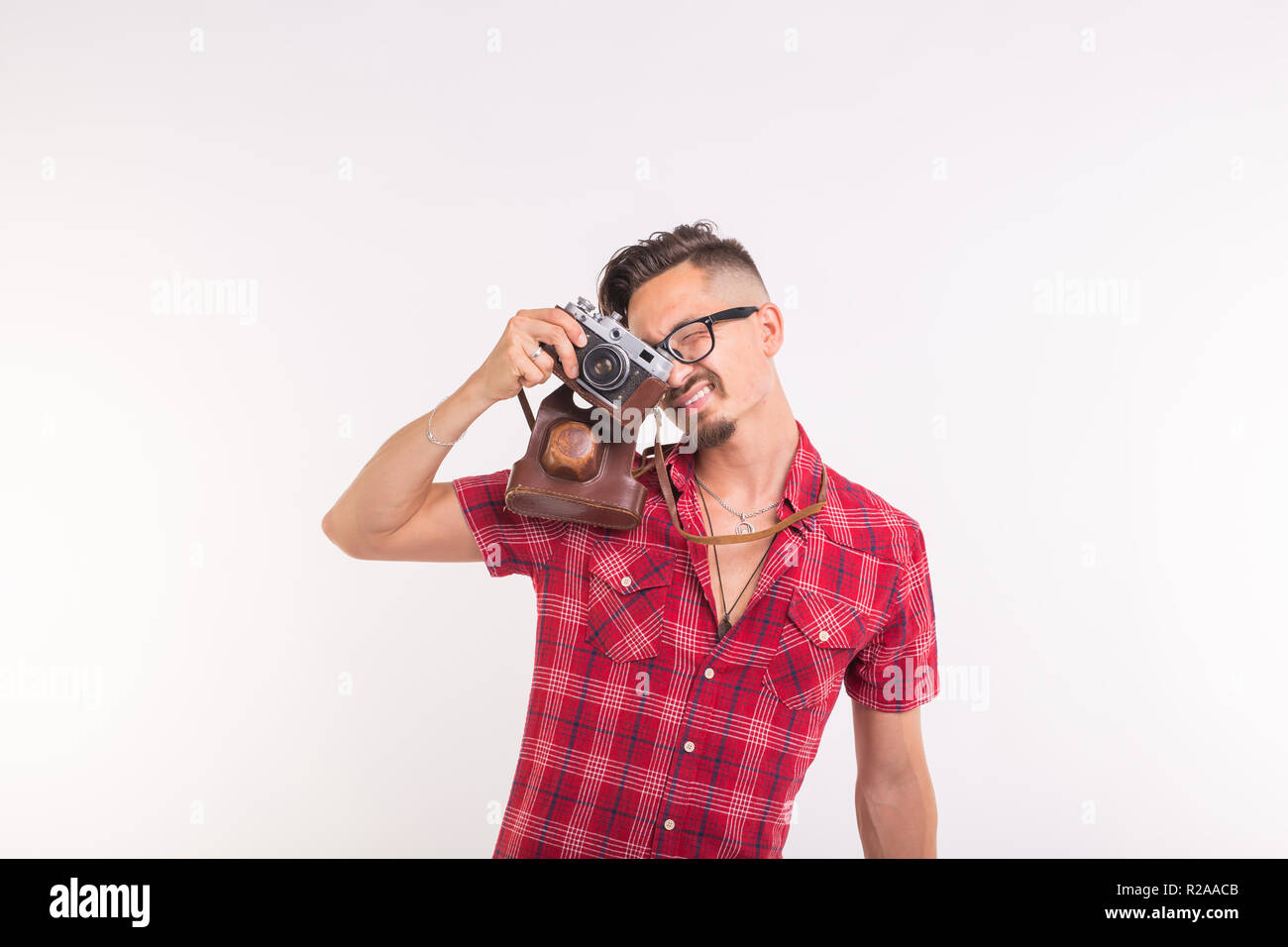 Vintage, photographer and people concept - handsome man with retro ...