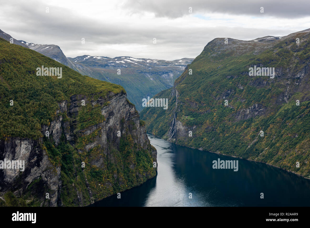 Rainy and cloudy summer day at Geiranger fjord UNESCO World Heritage ...